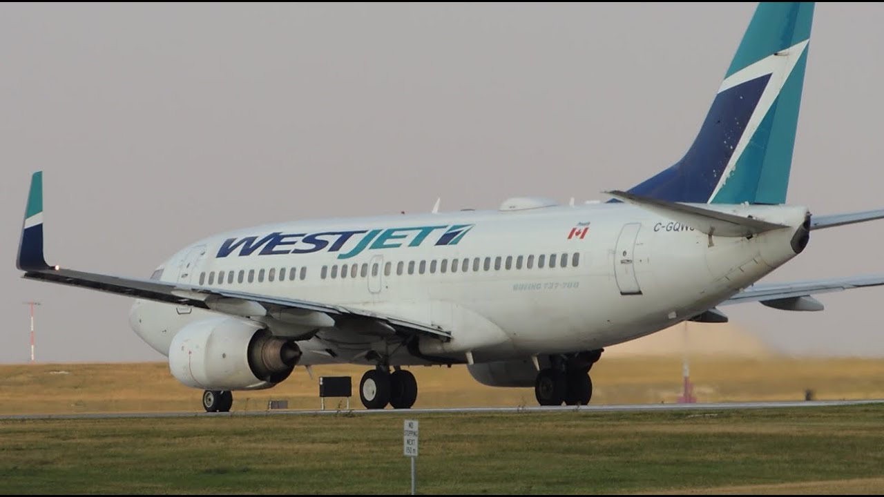 WestJet Boeing 737-700 [C-GQWJ] takeoff from YYC - YouTube