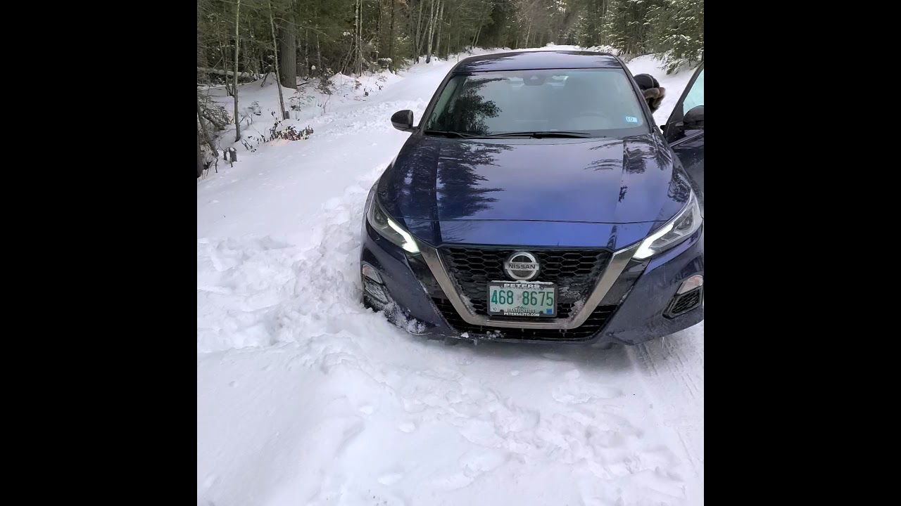 the blue car and we got stuck in the 2020 Nissan Altima all-wheel drive ...