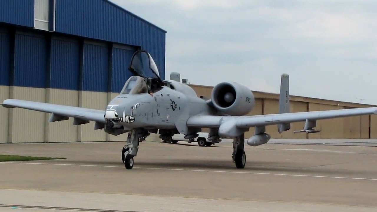 A-10 Warthogs taxiing with A-26C flyby. - YouTube