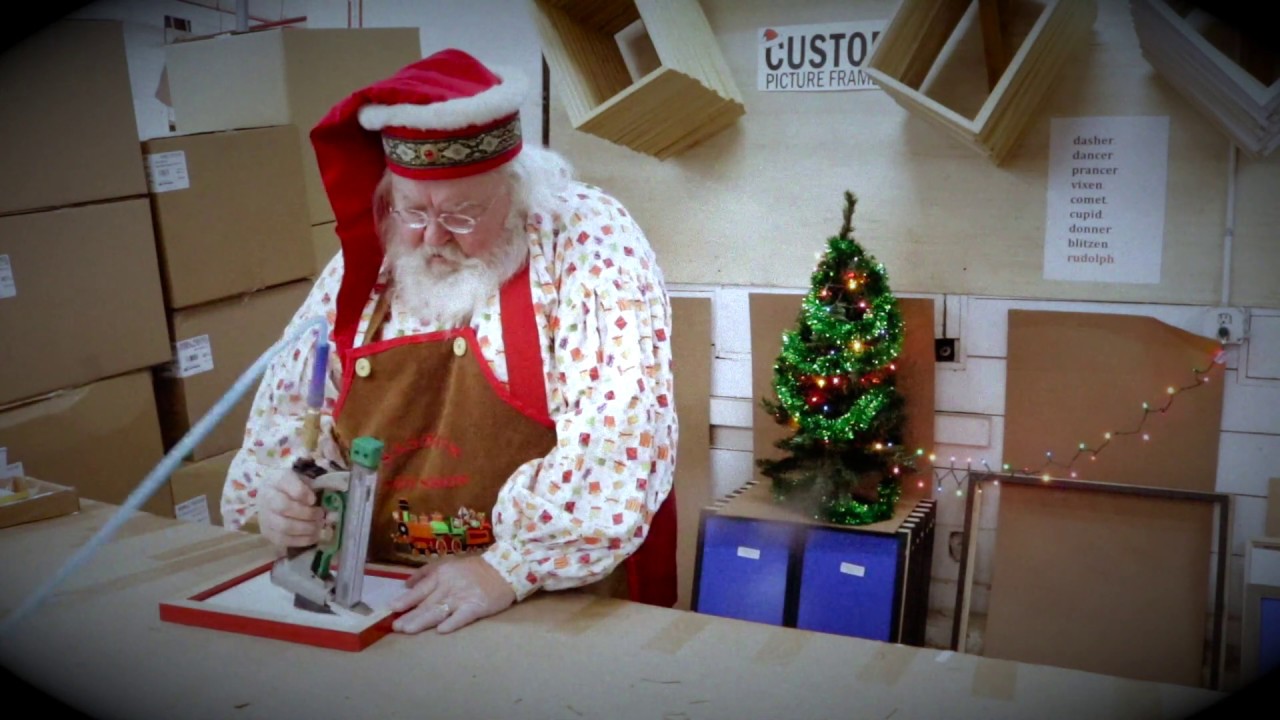 Santa Claus Helping Out in the CustomPictureFrames.com Shop! - YouTube