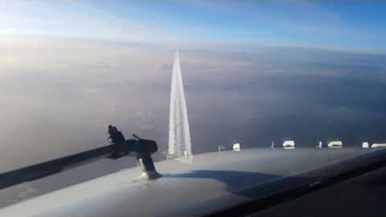Oncoming Aircraft Passes Beneath Plane || ViralHog - YouTube