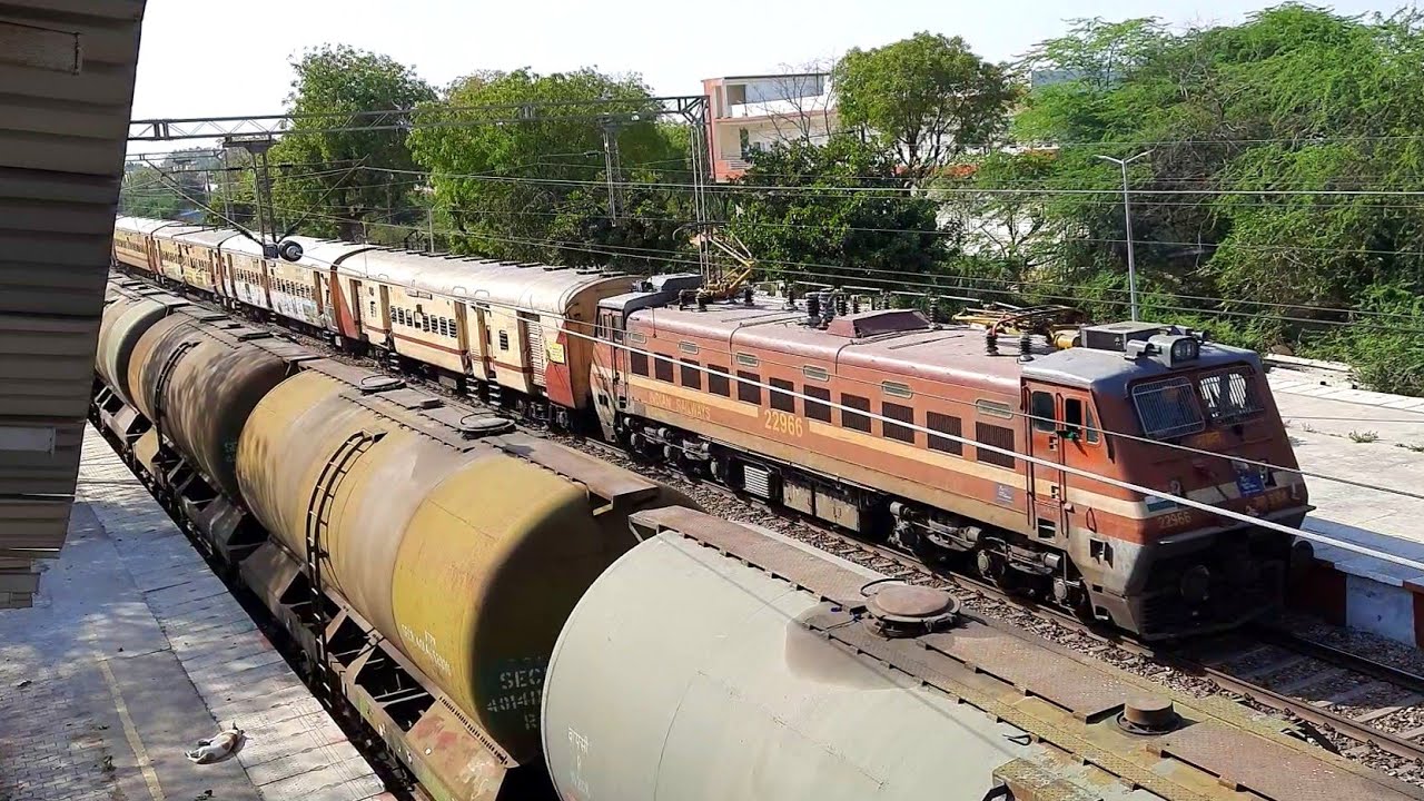 Jammu Tawi Pune Jhelum Express crossing Runkata with Bhusawal WAP 4 ...