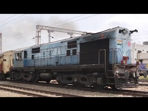 WATER/EARTH BLUE SHUNTER ENGINE SHUNTS EMPTY TRAIN AT TERMINUS YARD ...