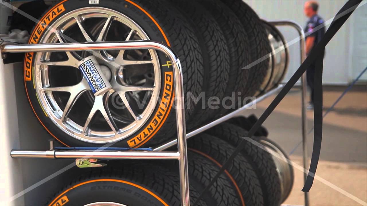 Racing Tires Mounted On A Rack - YouTube