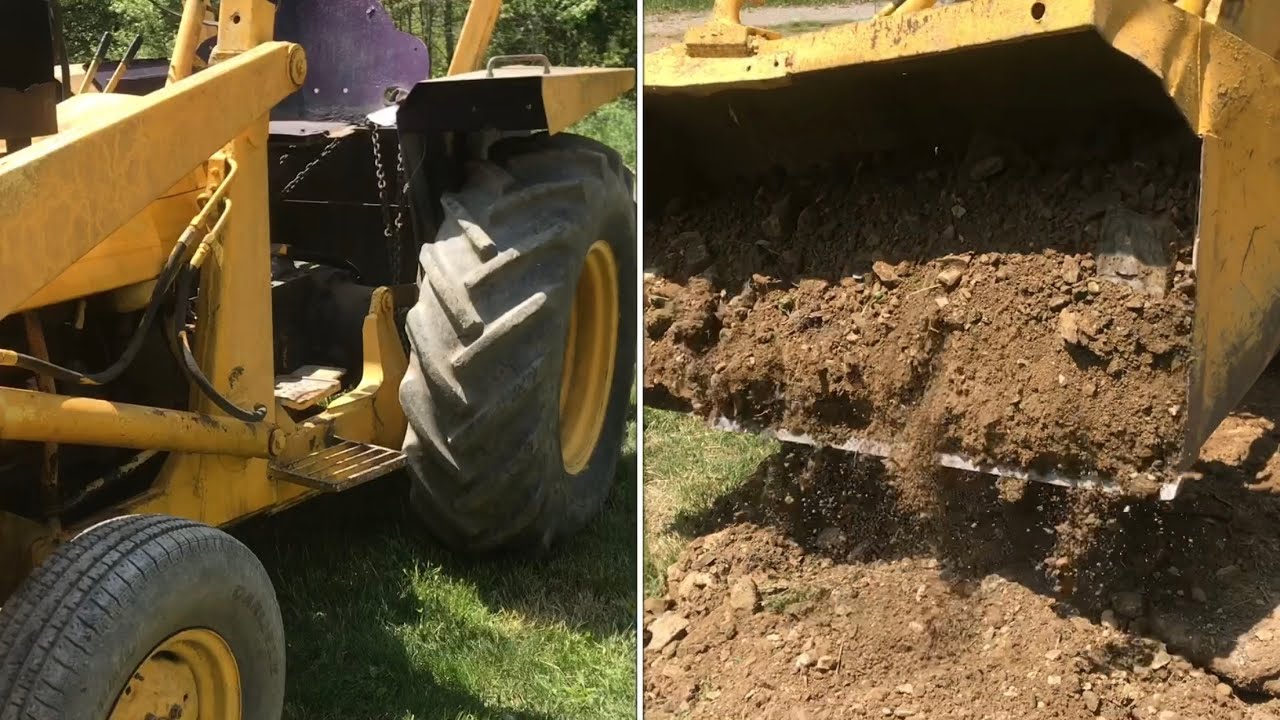 how to MOVE DIRT front in loader on a backhoe tractor - YouTube