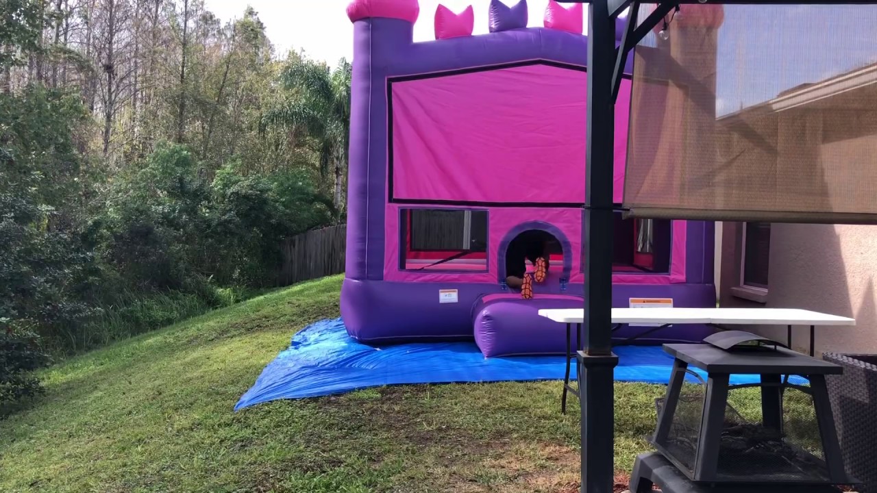 Castle bounce house roll up - YouTube