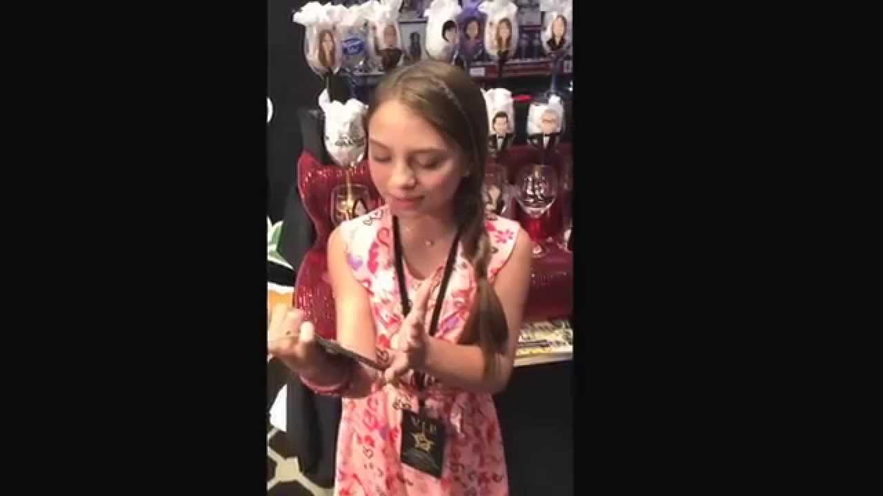 Actress Caitlin Carmichael shows off her custom painted slate by Cyndie ...