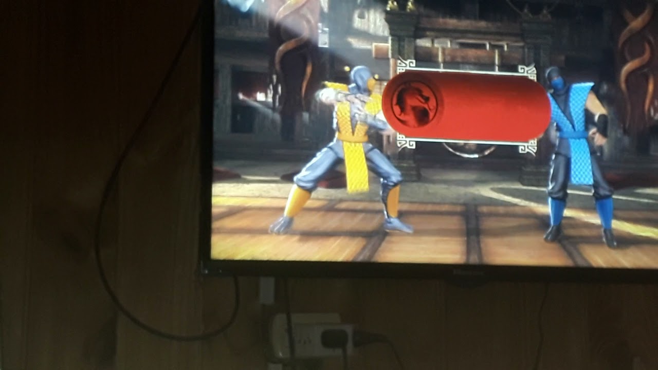 tutorial de como haser FATALITY toasty de scorpion en MORTAL KOMBAT 9 ...