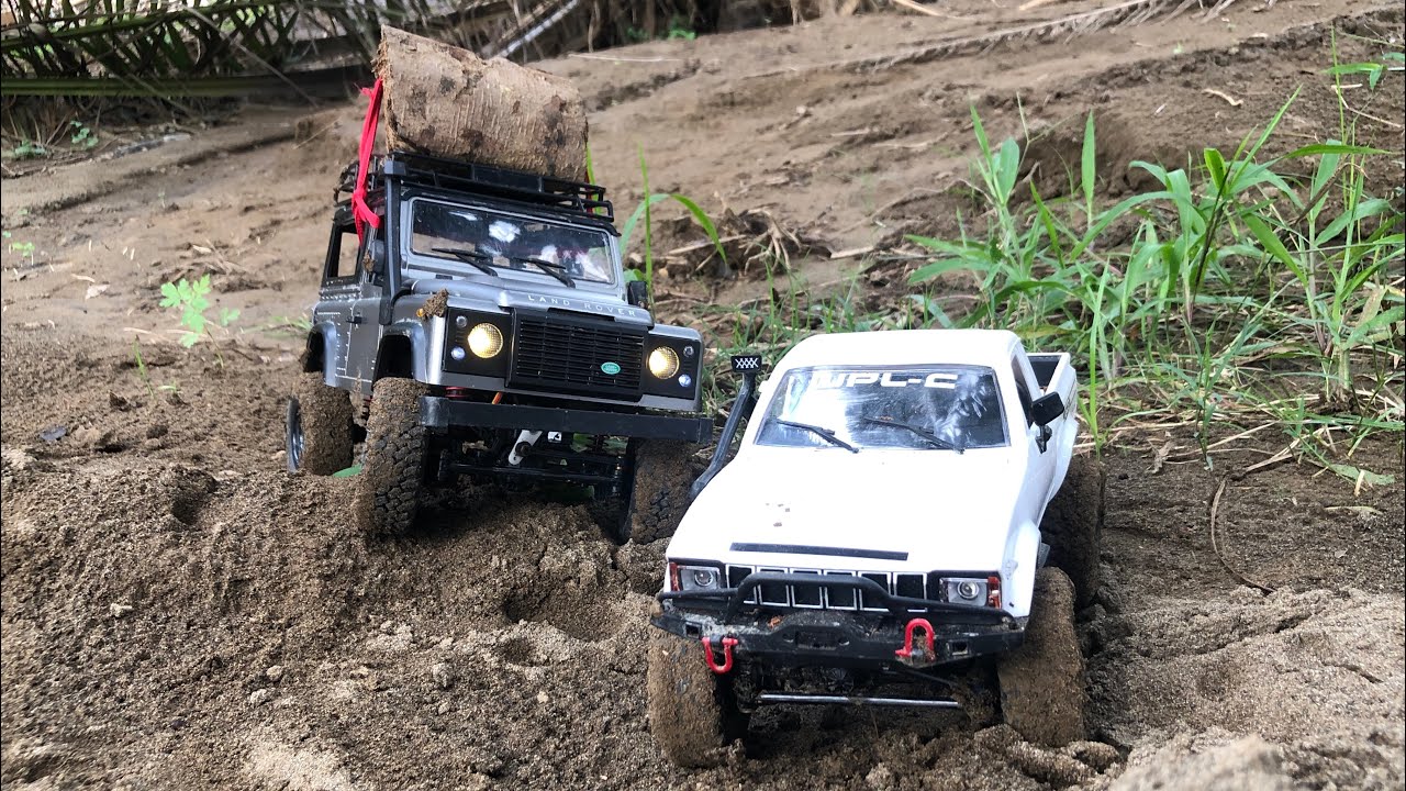 Land Rover vs. WPL Pickup in a Grueling Mud Road Challenge - YouTube