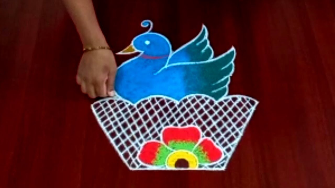 Beautiful rangoli design # 5 dots bird with mango rangoli design ...