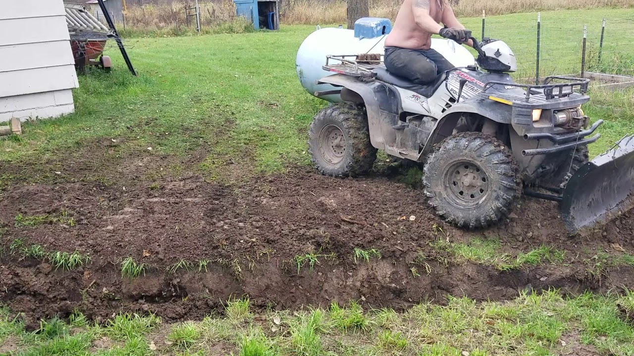 filling in the thermopex trench with the 4 wheeler - YouTube