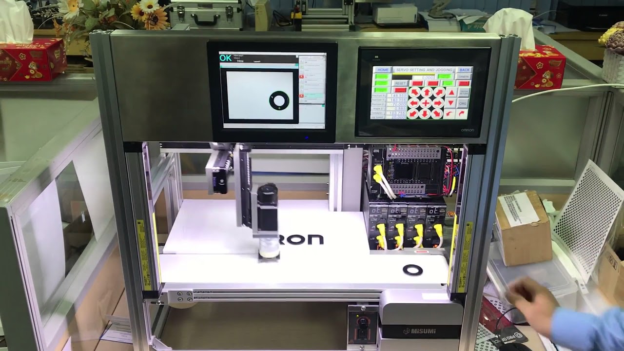 NX1P2 conveyor tracking by Vision - YouTube