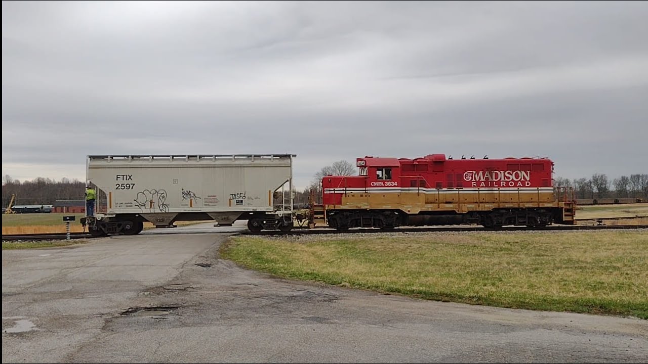 Madison Railroad 3634 shoving hopper east bound at the Jefferson ...