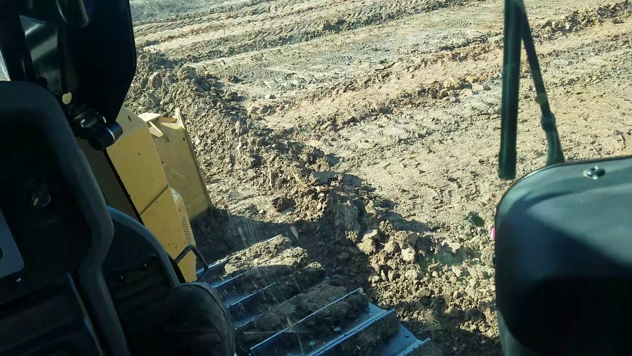 Trying to finish grade a building pad with D6K2 & trimble 2D laser ...