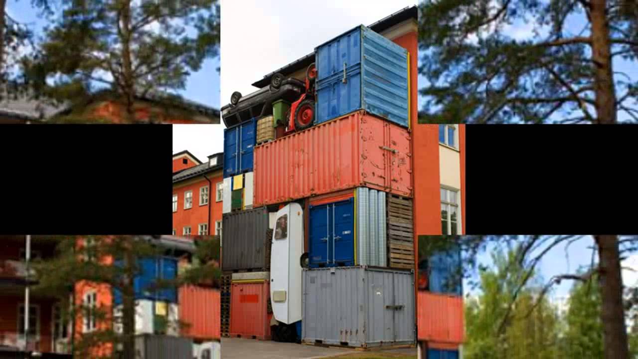 Shipping Containers and Cars Stacked High as Colorful Eco Sculptures ...