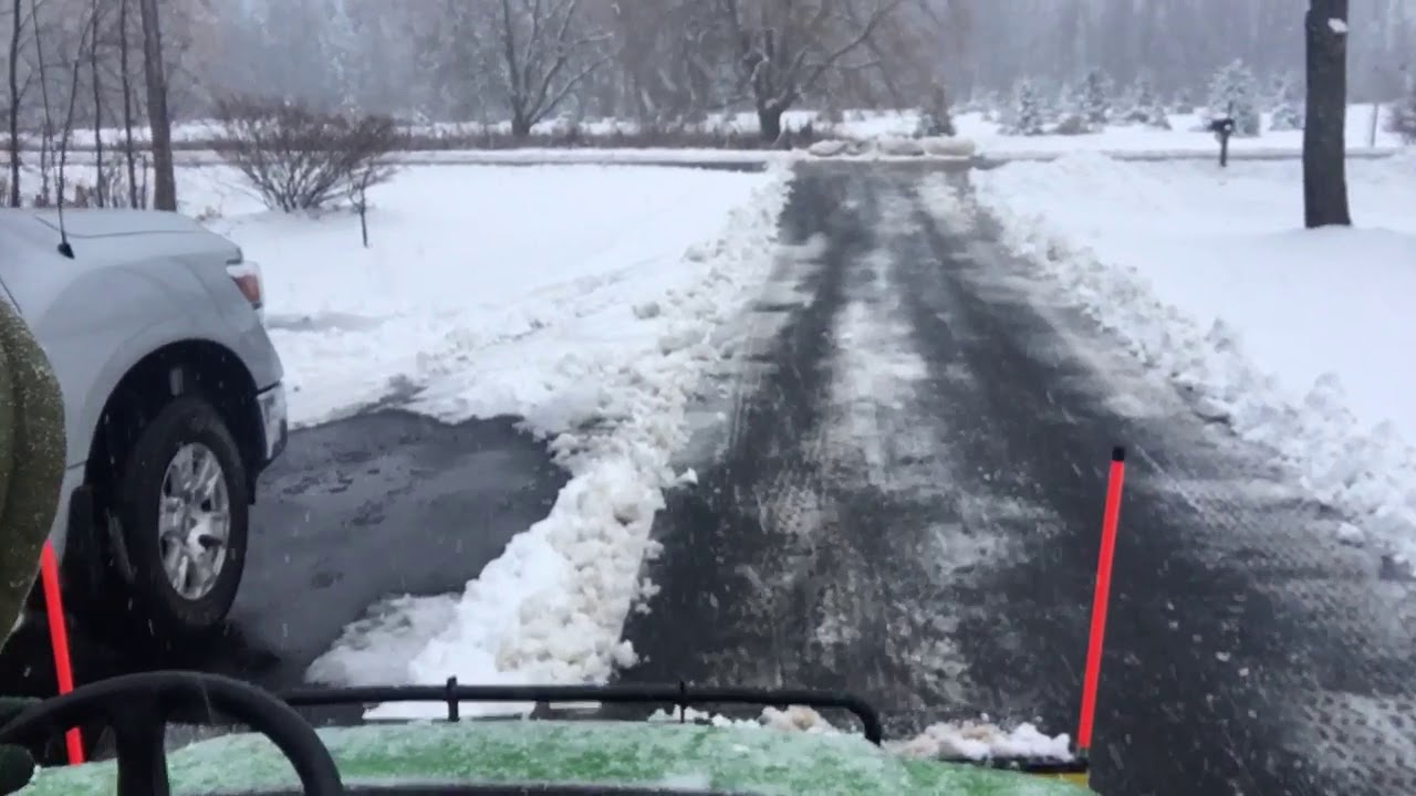 John Deere Gator snowplowing wet heavy snow! - YouTube