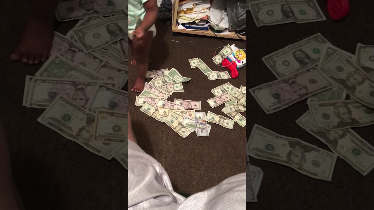 BABY PLAYING IN MONEY - YouTube