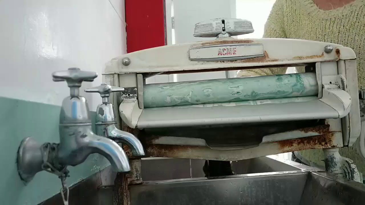 Washing the kids' clothes with a mangle - camping life - YouTube