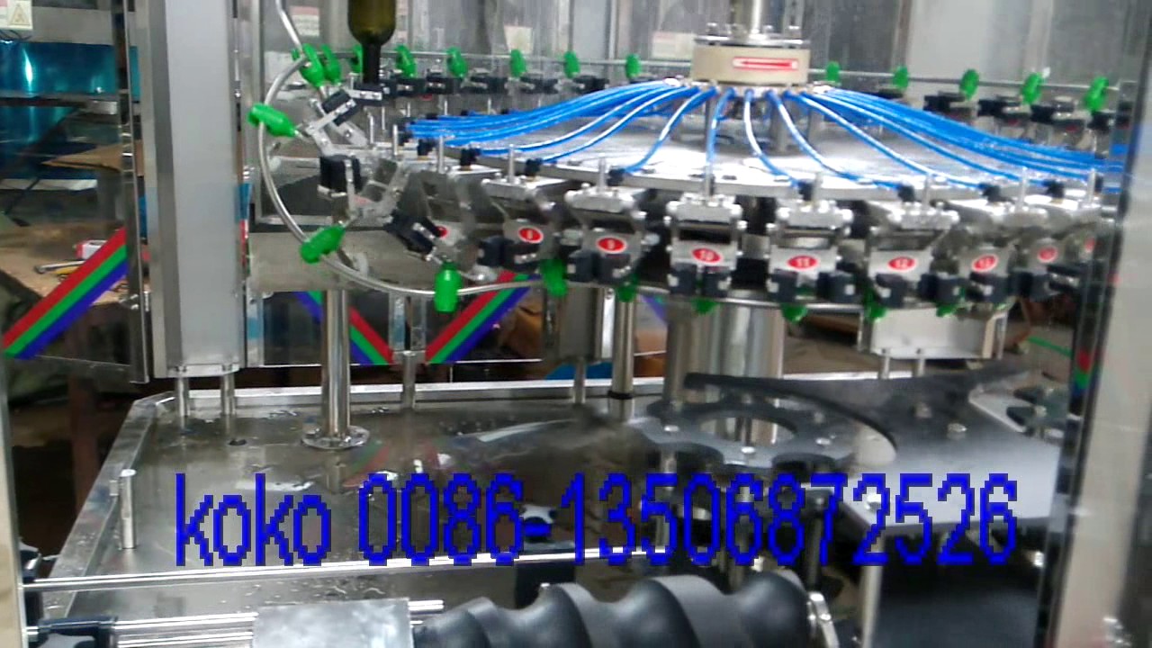 Screw bottle infeed glass bottle washing machinery 30 nozzles - YouTube