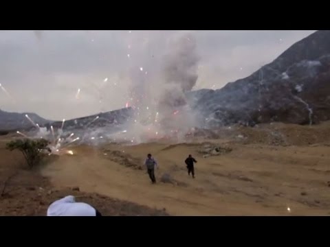 Panic as fireworks pile explodes - YouTube