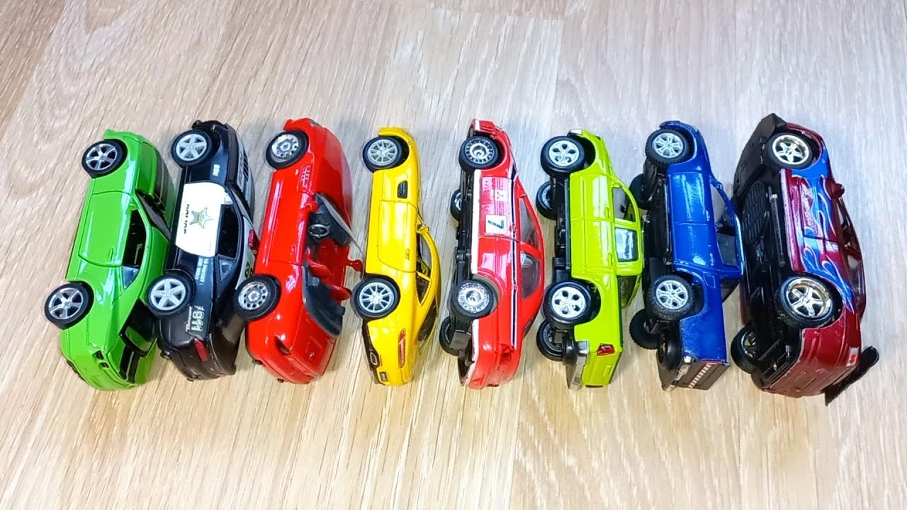 Some small colored bright car models from a big box - YouTube