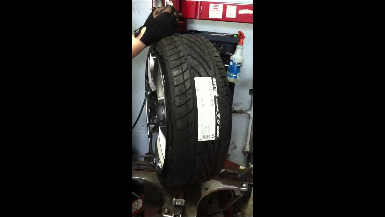 Stretching a 225/35/R20 on 20x9 wheel - YouTube