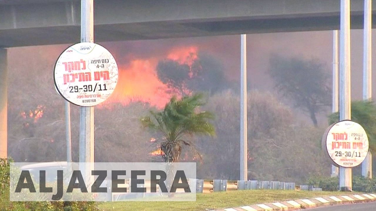 Israel: Thousands ordered to leave after massive fires hit Haifa - YouTube