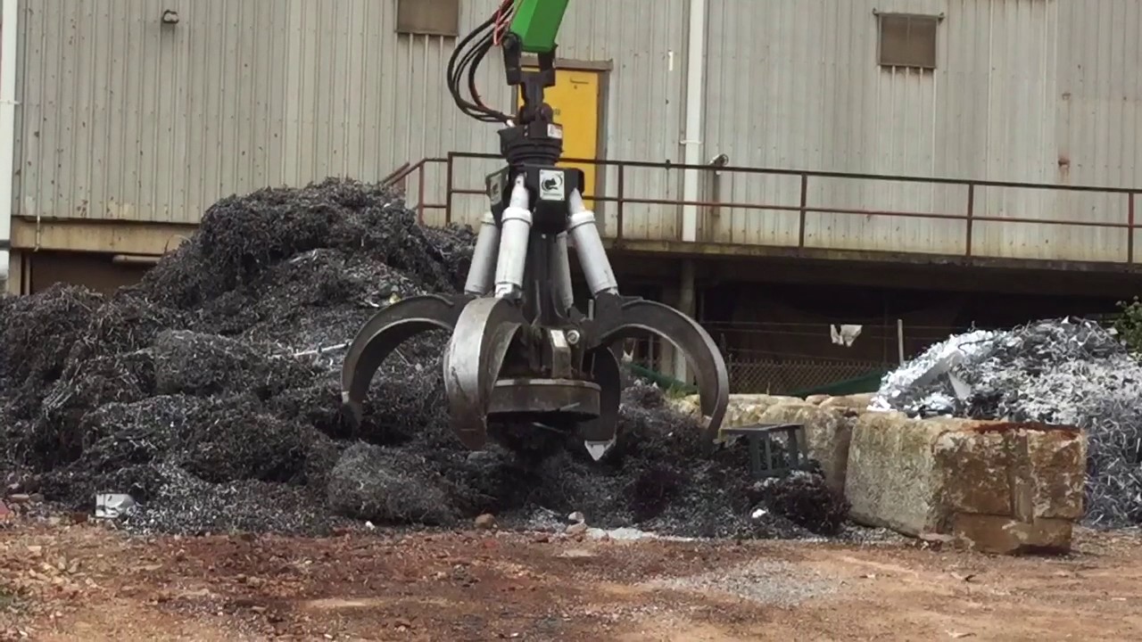 Sennebogen 830M E series with Rotobec magnet grab - YouTube