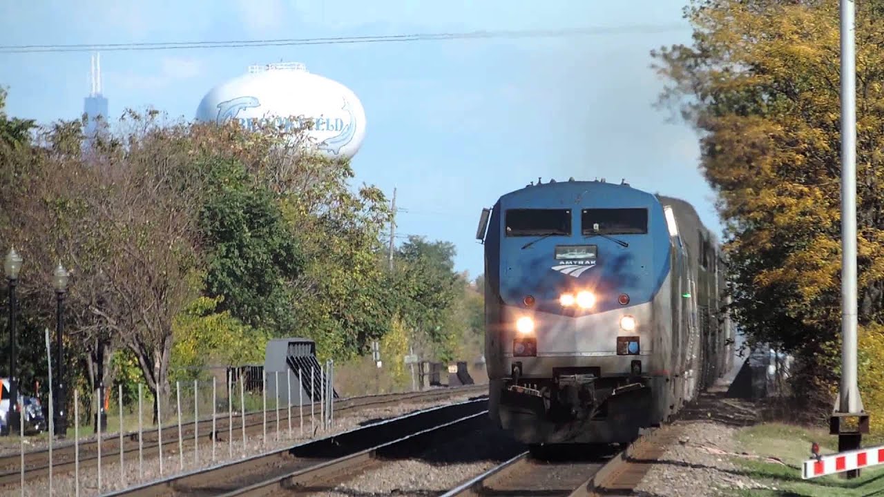 Amtrak engine 114 leads a fast train through La Grange IL - YouTube