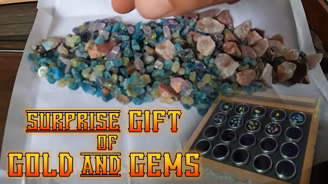 Packing GOLD NUGGETS AND ROUGH GEMSTONES into a DISPLAY BOX for a ...