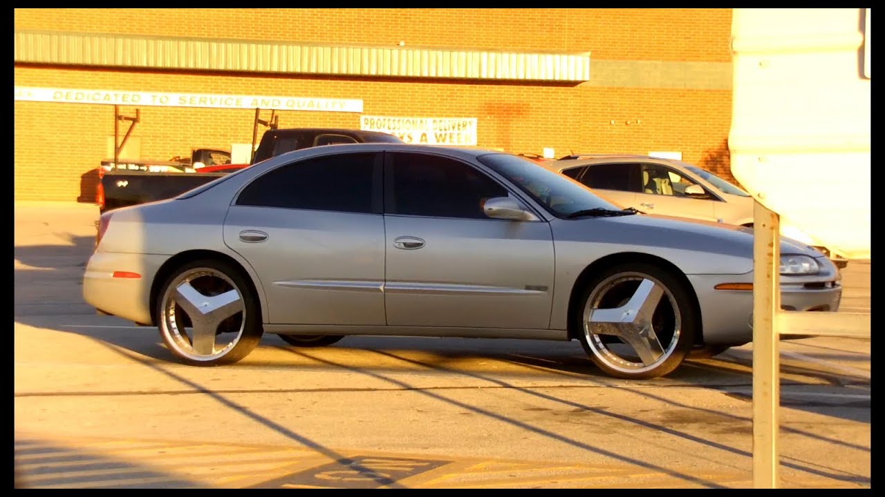 Oldsmobile Aurora on 22's - YouTube
