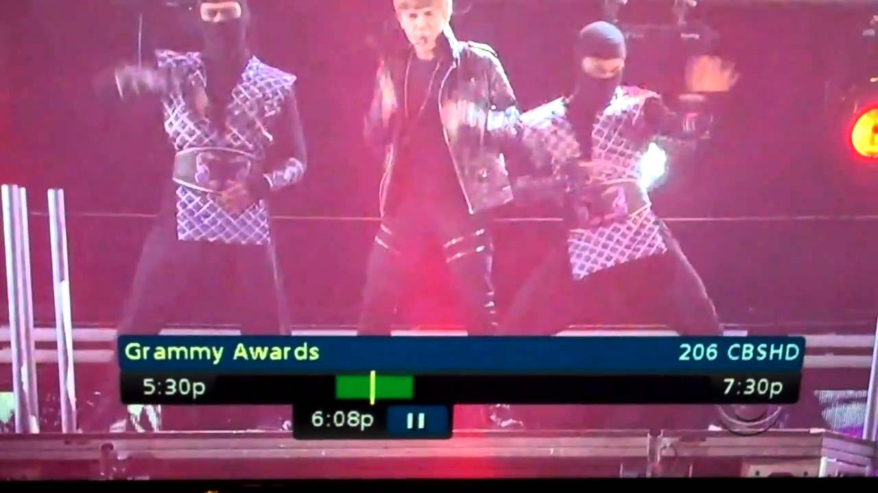 Justin Bieber pushes backup dancer live at the Grammys - YouTube