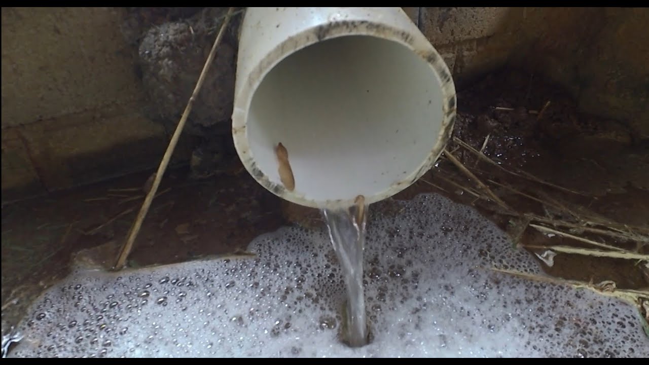 Catching gutters and cutting a swale - YouTube