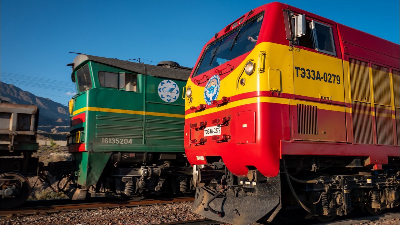 Diesel locomotive TE33A-0279 with the branded train "Blue Issyk-Kul ...