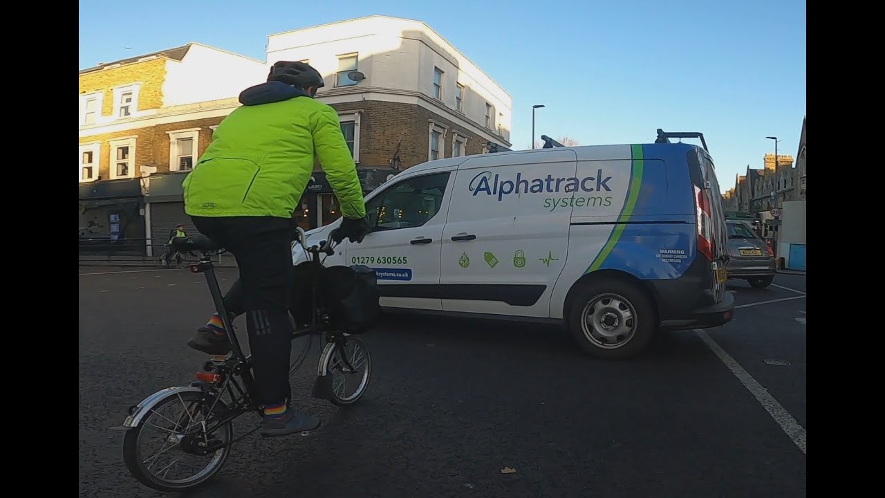 Alphatrack System van runs "Red light" and almost hits cyclist - YouTube