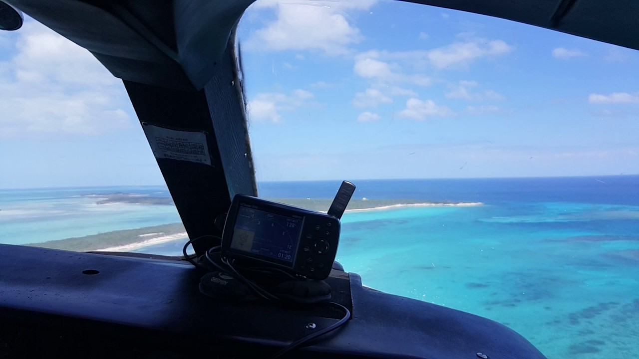 Flying over Big Whale Cay and Little Whale Cay in Britten Norman ...