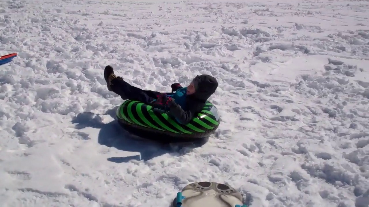 Tyler sledding in Point Beach, Milford - YouTube