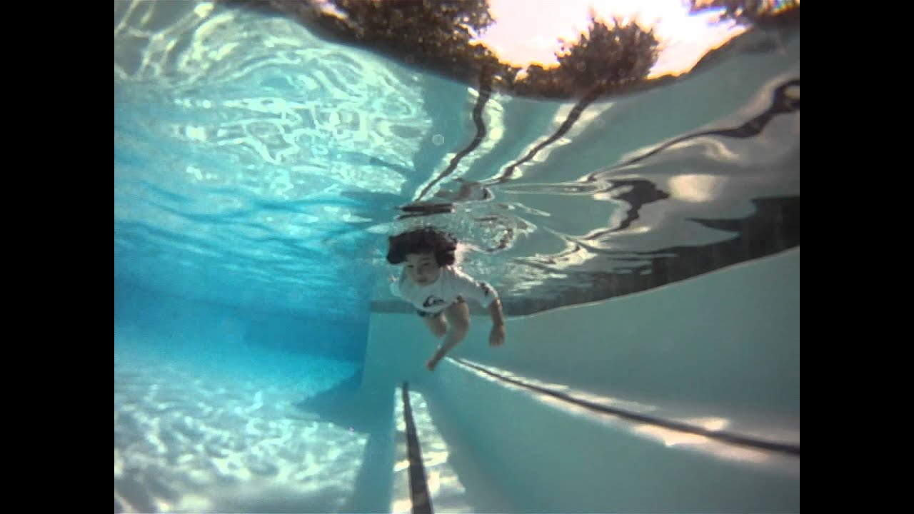 Weasel practicing his swimming skills - YouTube
