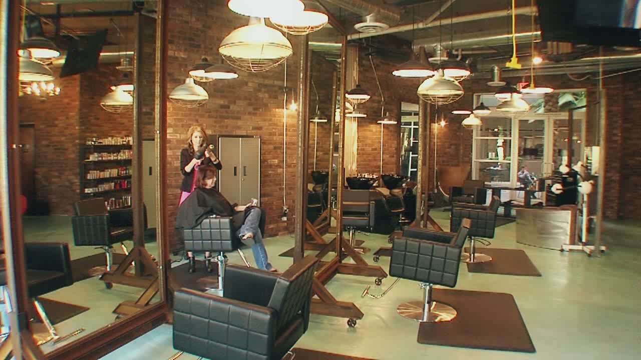 Need a new hairdo? Try a trendy, new, high-tech salon - YouTube