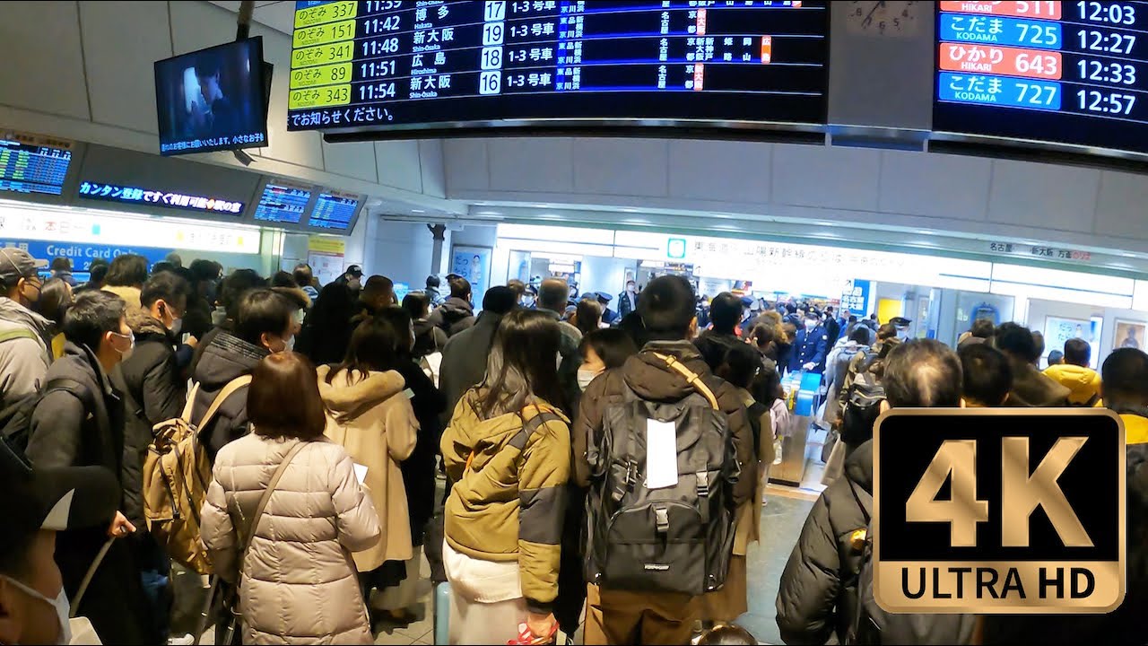 Tokyo Station Shinkansen ticket gate with lots of returning traveler ...