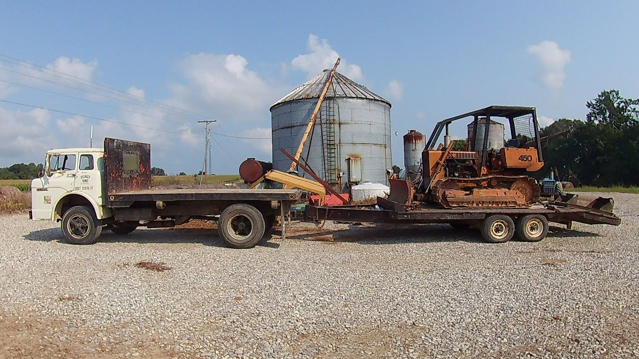 Moving the 450 Case Dozer with the C600 Ford - YouTube