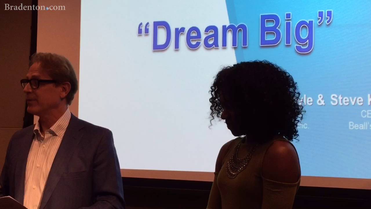 Bealls CEO Steve Knopik congratluates Amber Grace on University of ...