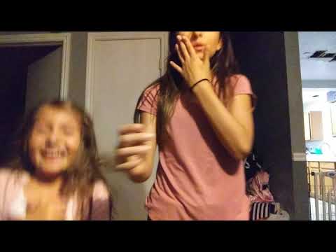 Cheer with my sister (her pants are unbuckled)