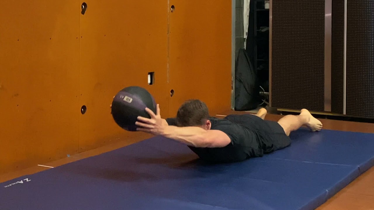 Medicine Ball Prone Side-to-Side Arm Reach - YouTube