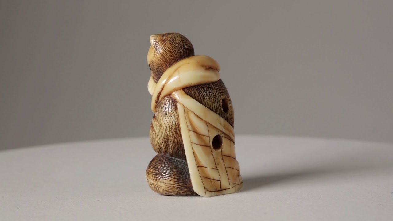 Netsuke - Tanuki in monk’s robes - YouTube