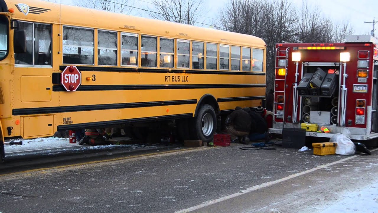 Truck wedged under Commodore Perry school bus - YouTube
