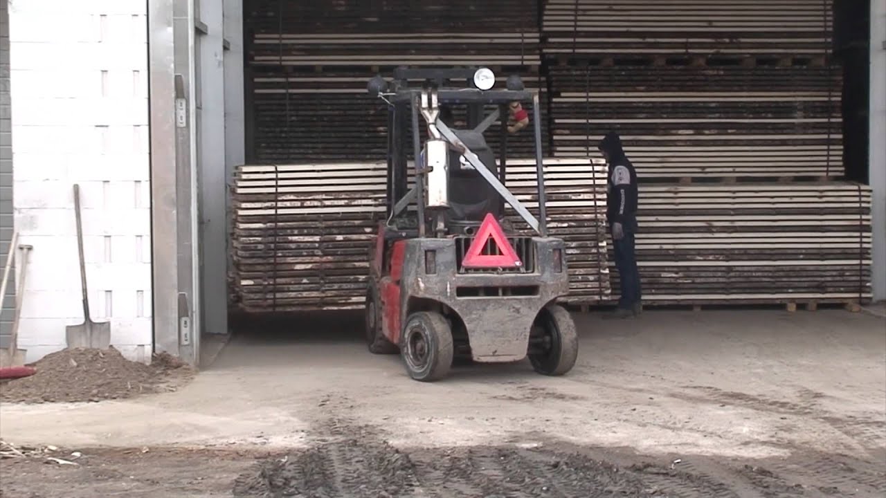 Loading the boards into kiln for drying MMK Wood, Latvia - YouTube
