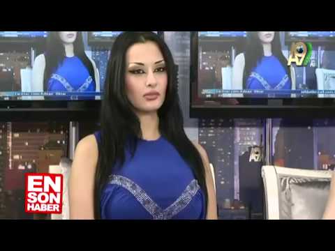 Adnan Oktar'ın kediciklerinden dekolte açılımı