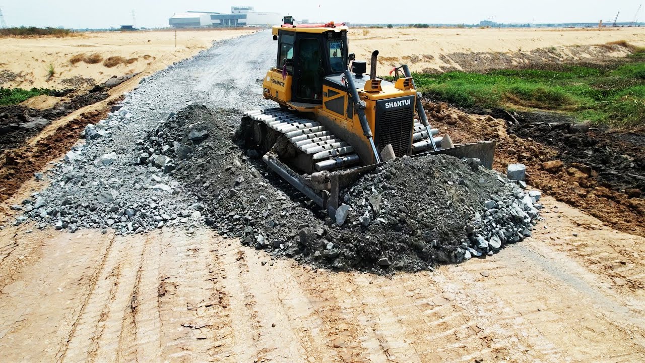 Skills Operator Building New Road, Bulldozer Pushing Blue Stones Above ...