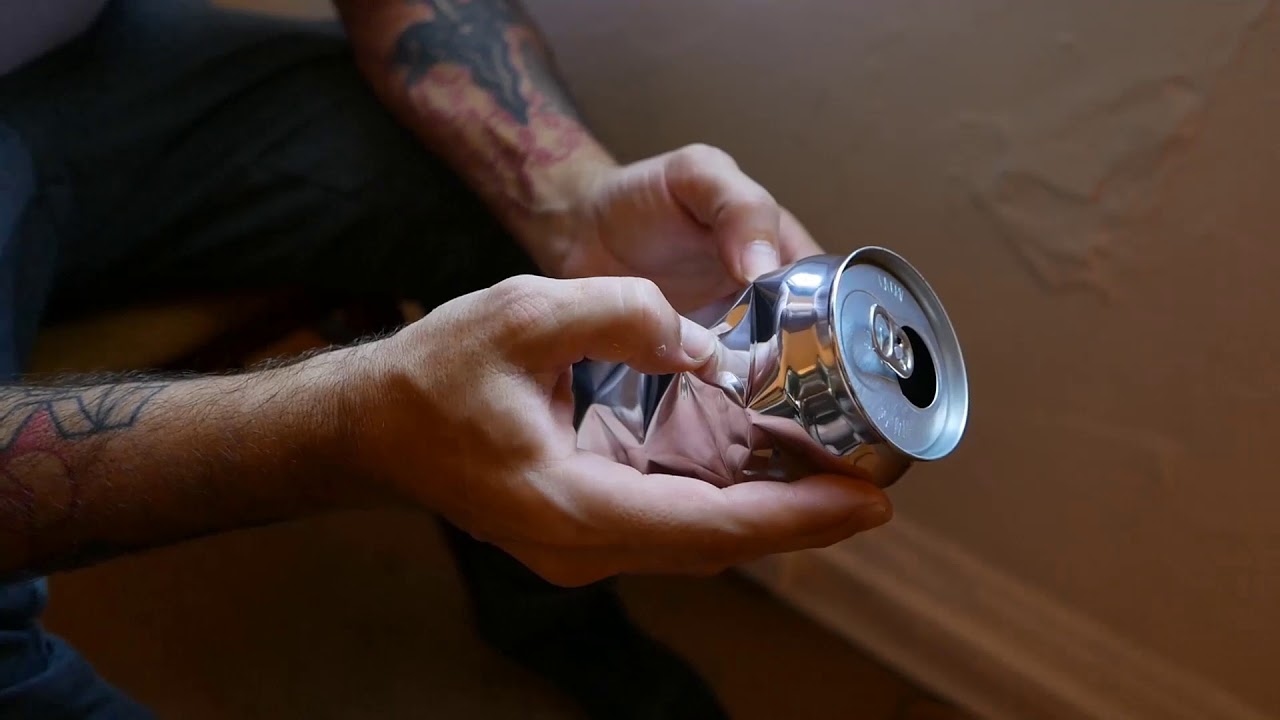 Art from trash - dented can sculpture - YouTube